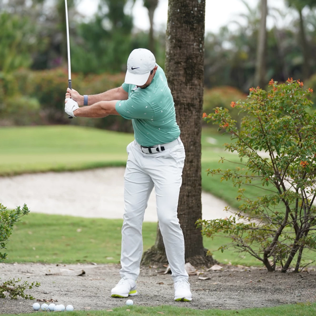 Four tips on how to hit golf shots from soft, wet lies